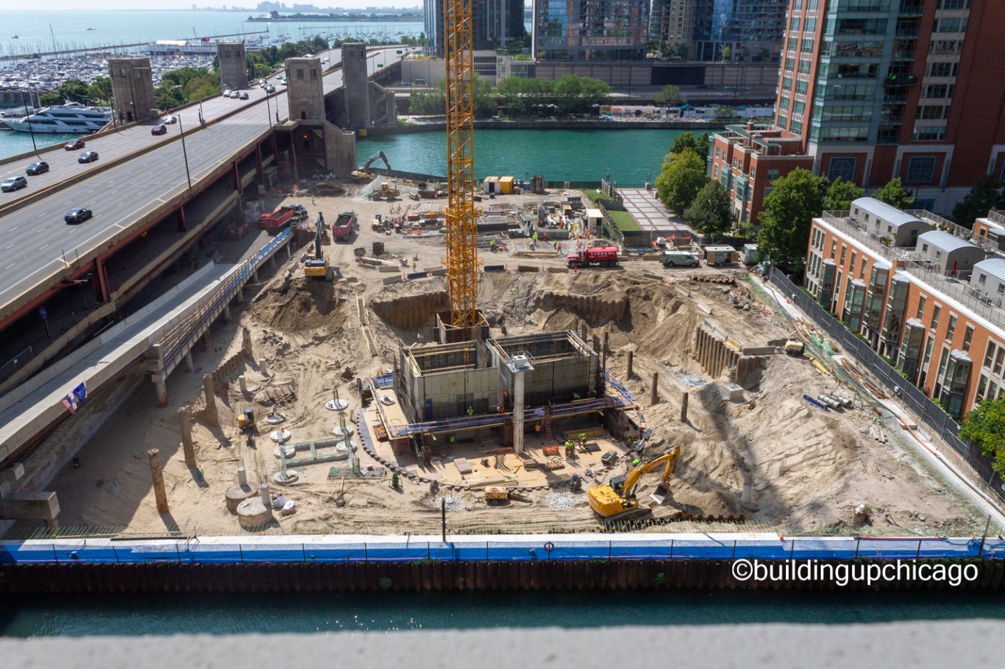 The Spire Hole is gone, the ramp is in, and 400 Lake Shore is starting ...