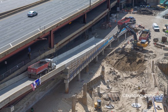 The Spire Hole is gone, the ramp is in, and 400 Lake Shore is starting ...